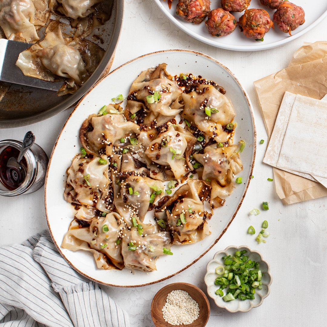 Beef "Blanket Dumplings" with Chili Crisp Sauce, Green Onions & Sesame ...