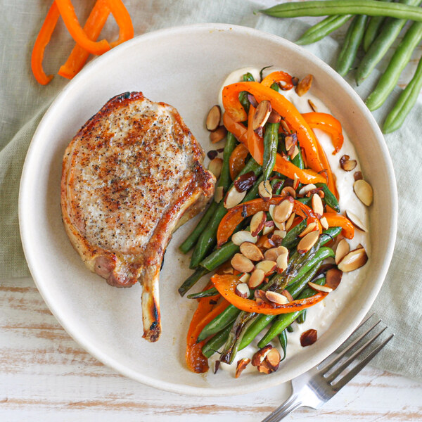 Broiled Pork Chop with Green Beans, Peppers, Tahini Yogurt & Almonds ...