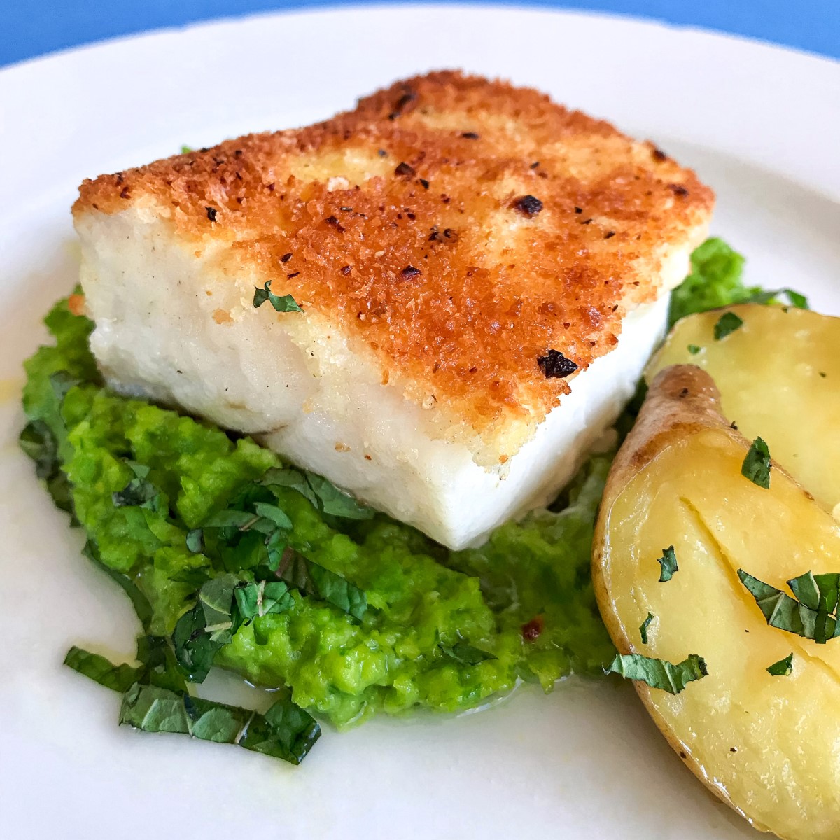 Crispy Parmesan Baked Cod with Mushy Peas | Shaw's