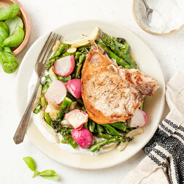Pork Chop with Warm Fennel, Radish & Asparagus Salad over Lemon Yogurt ...