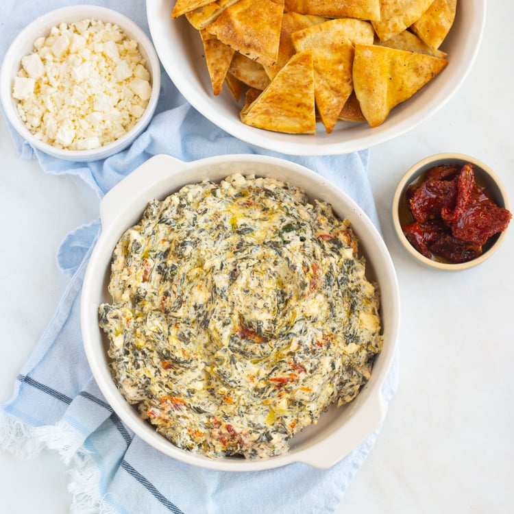 Slow Cooker Spinach, Feta & Sun-Dried Tomato Dip with Pita Chips | Safeway
